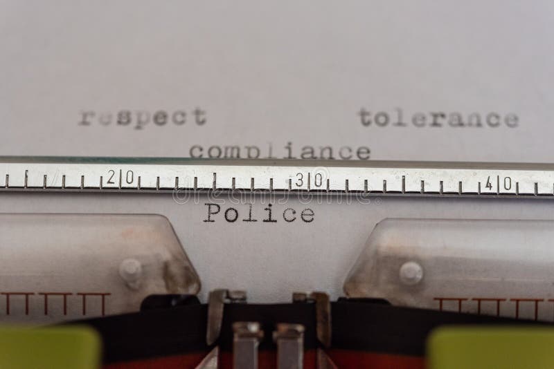 Typewriter with a Leaf and the Words Respect, Tolerance, Compliance and ...