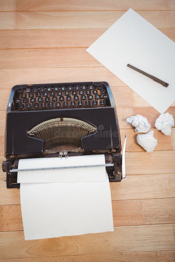 Typewriter and Papers at Desk in Office Stock Photo - Image of angle ...
