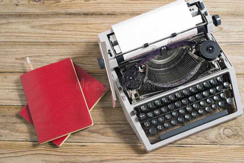 Typewriter and Red Notebook Stock Photo - Image of report, publish ...