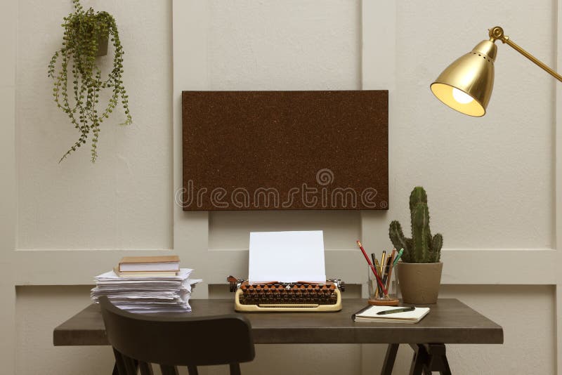 Typewriter and Stack of Papers on Dark Table in Room. Writer`s ...