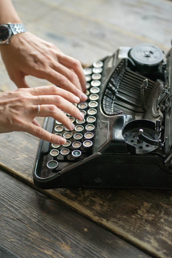 A Typewriter Stands on a Wooden Table Stock Photo - Image of classic ...