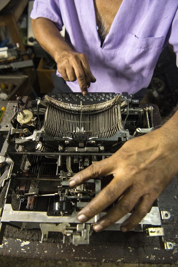 Typewriter technician stock image. Image of india, maintenance - 230915739