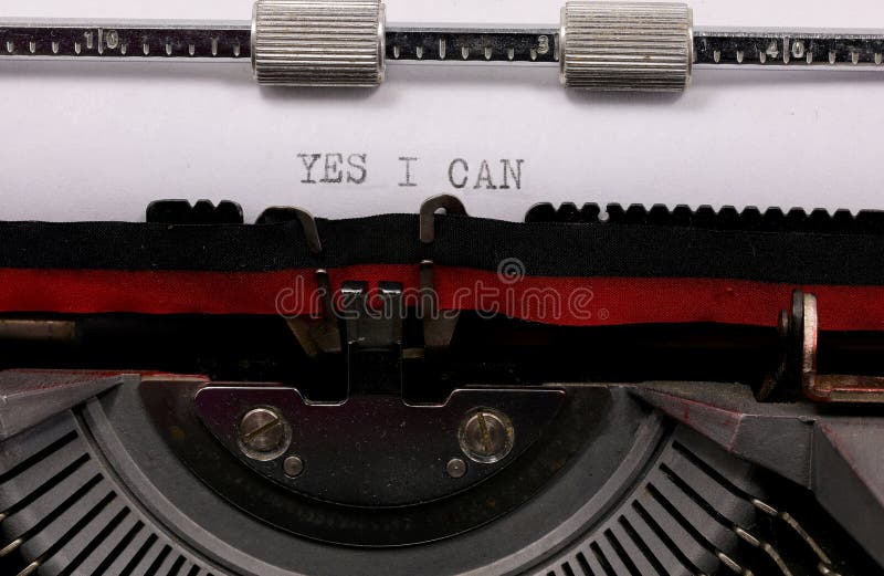 Typewritten YES I CAN with Vintage Typewriter Symbolizing the ...