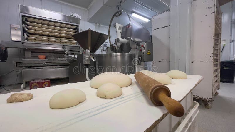 Typical Baker`s Utensils in Front of the Bread Making Machines. Concept ...