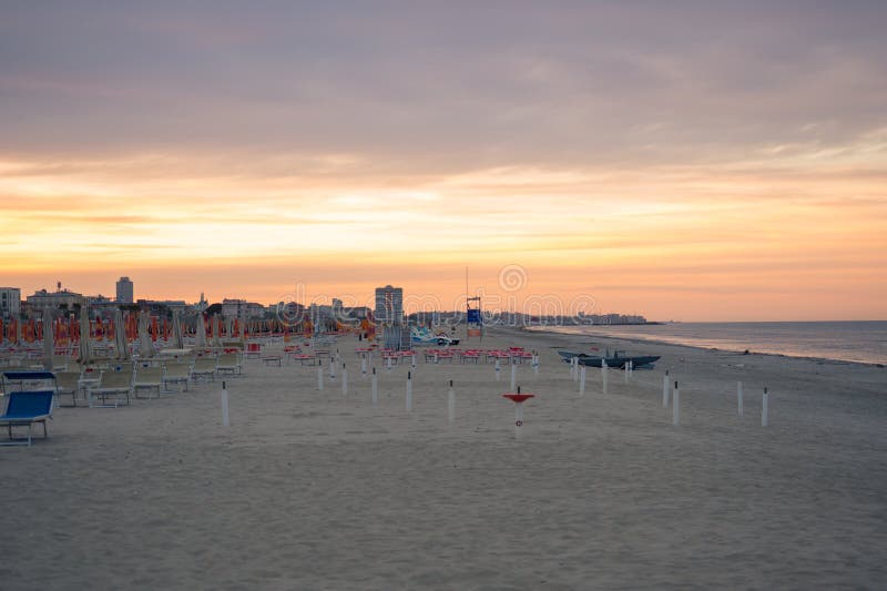Typical Beach of the Romagna Riviera at Sunset. Stock Image - Image of ...