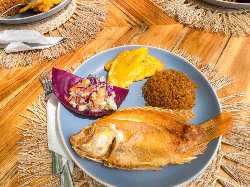 Typical Dish of the Colombian Caribbean. Fried Fish with Coconut Rice ...