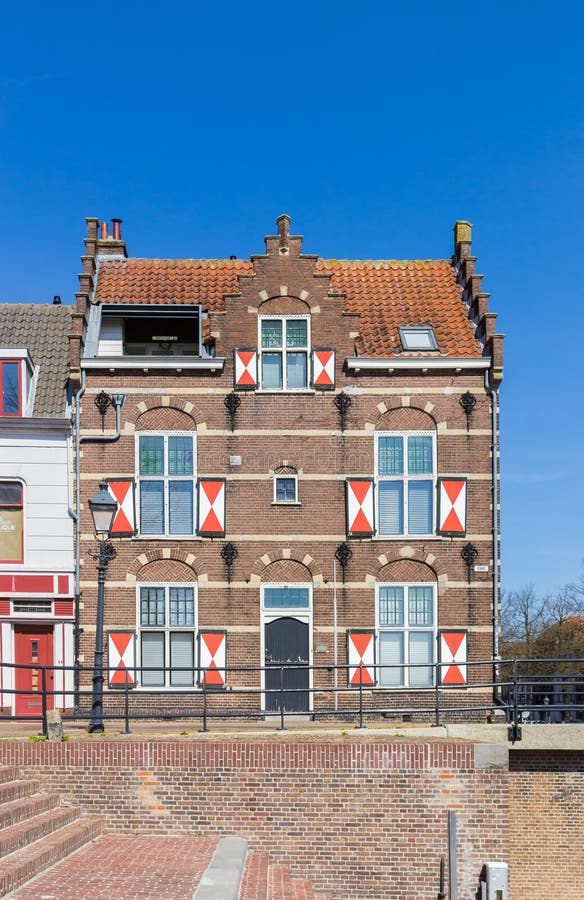 Typical Dutch House with Red and White Shutters in Gorinchem Stock ...