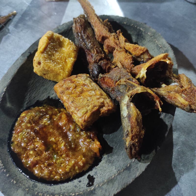 Typical Food from East Java Pecel Lele. Dry Fried Catfish Served with ...