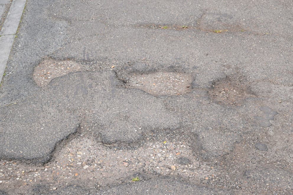 Several deep potholes stock photo. Image of scene, floor - 278542600