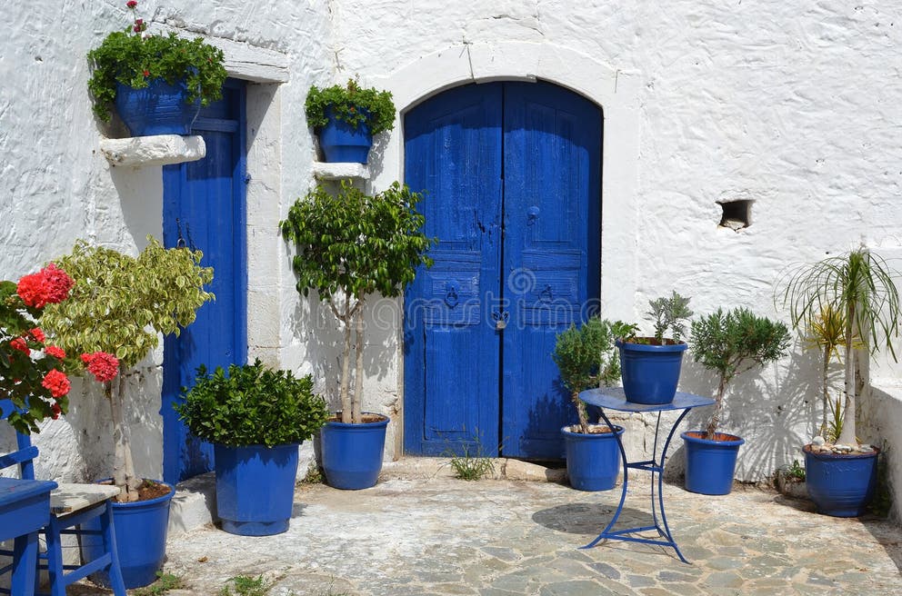 Typical greek courtyard. stock image. Image of plants - 25850393