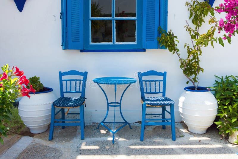 Typical Greek Outdoor Still Live with Blue Table and Chairs Stock Photo ...