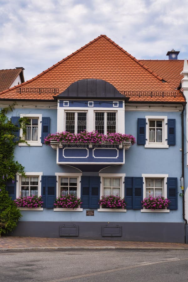 Flower-decorated House Facade Stock Image - Image of outdoors ...