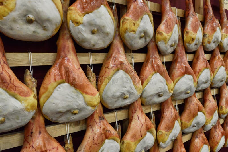 Typical Italian Raw Ham Hanged in Rows Stock Photo - Image of pork ...