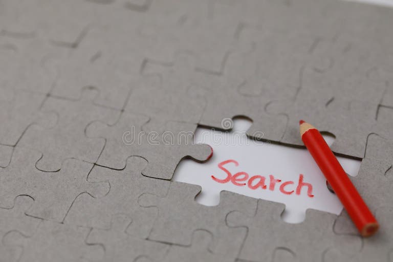 A Typical Jigsaw Puzzle with Search and Red Crayon Stock Image - Image ...
