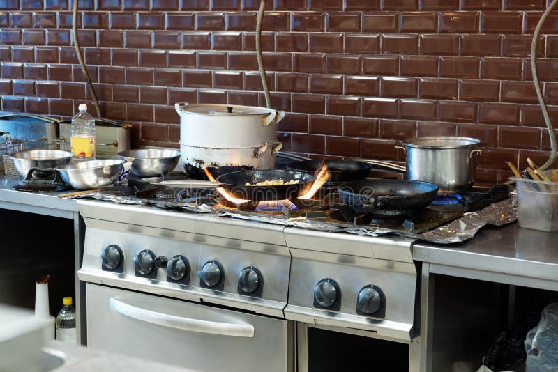Kitchen of a restaurant stock photo. Image of crock, equipment - 61604836