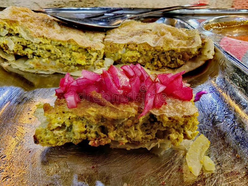 Typical Malaysian Dish, Chicken Murtabak with Onion and Rose Syrup ...