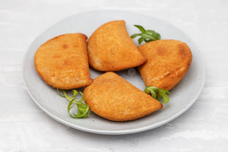 Typical Portuguese Appetizer Rissois De Carne on Plate Stock Photo ...