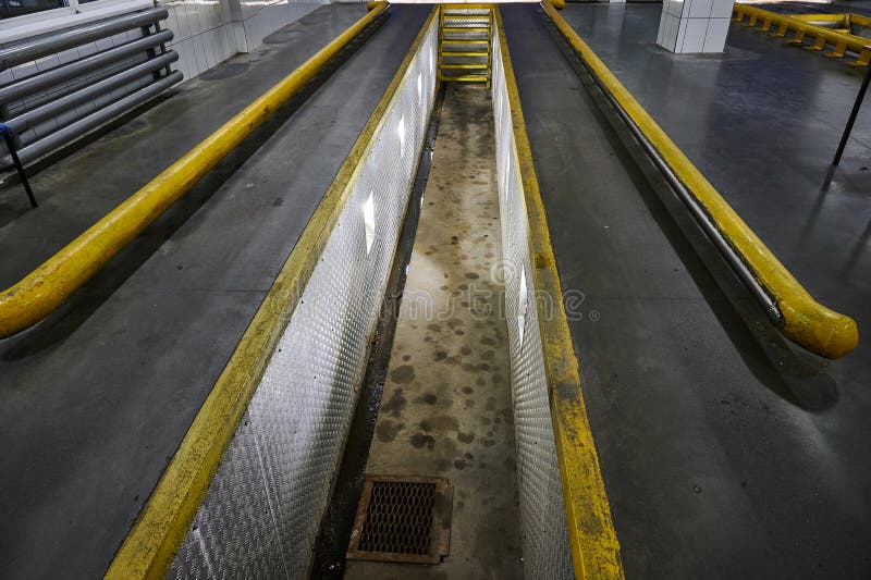 Typical Professional Car Maintenance Diagnostic Pit Equipped with a ...