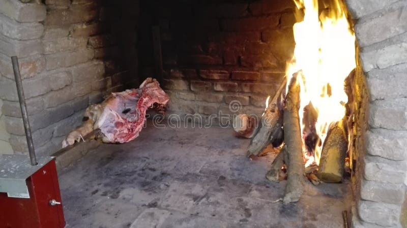 Sardinian Piglet In Cooking Stock Image - Image of coal, fire: 111854989