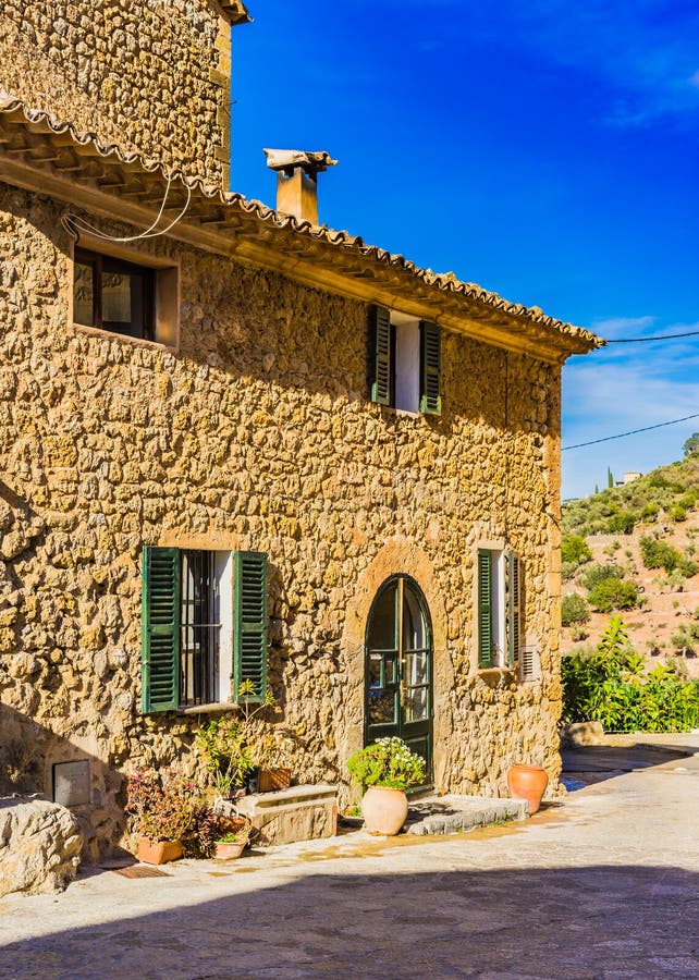 Rustic Mediterranean House with Open Windows Shutters an Balcony Stock ...