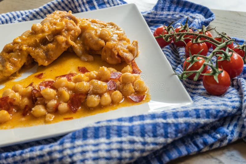 Typical Spanish Dish, Braised Pork Feet with Chickpeas Stock Image ...