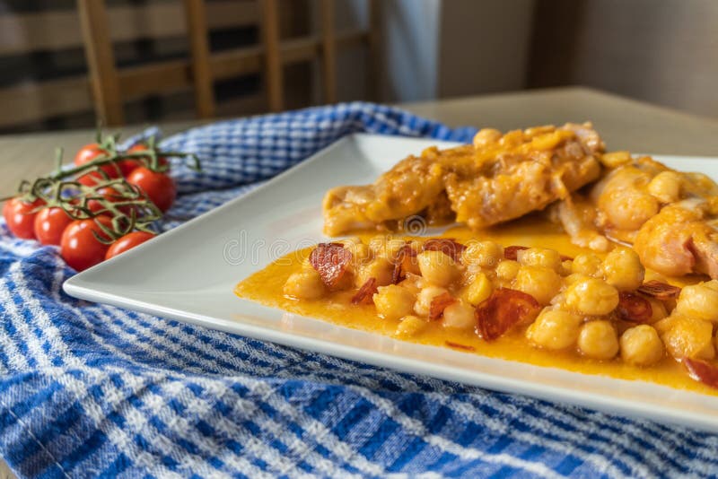 Typical Spanish Dish, Braised Pork Feet with Chickpeas Stock Photo ...