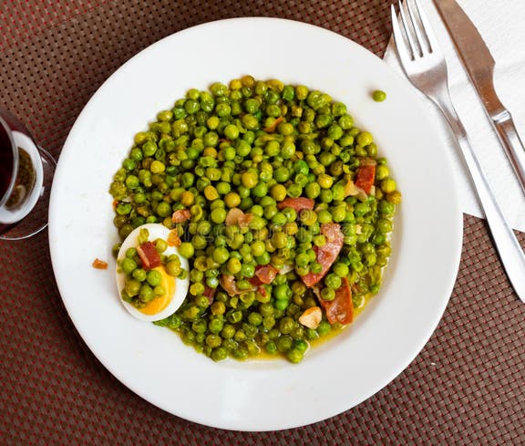 Typical Spanish Side Dish Peas with Jamon Stock Image - Image of ...