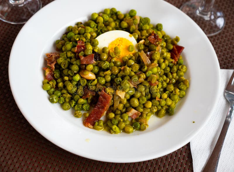 Typical Spanish Side Dish Peas with Jamon Stock Photo - Image of ...