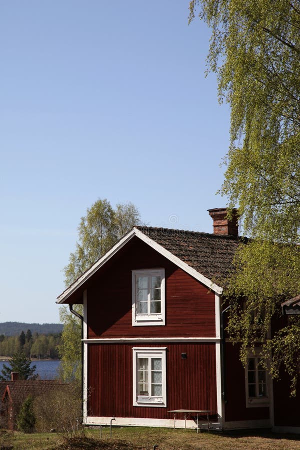 Red cottage by lake stock photo. Image of cottage, travel - 30708024