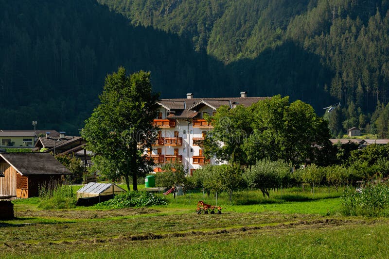Typical View of the Small Town of Imer, in the Dolomites Mountains ...