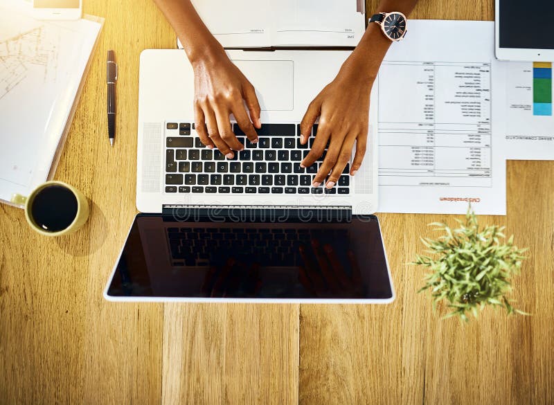 Typing the Day Away. High Angle Shot of a Unrecognizable Persons Hands ...