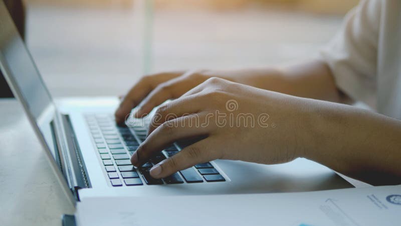 Document Printing on a Laptop, Working on Sending Text Messages on a ...