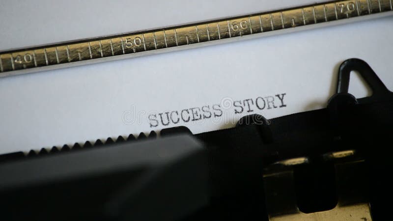 Typing the Expression SUCCESS STORY with an Old Manual Typewriter Stock ...