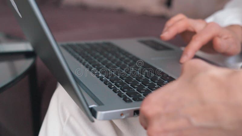 Typing Hands on Laptop Keyboard in Office Setting with Fast Motion Blur ...