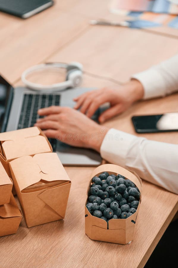 Typing on Keybord. Top View of Hands of the Man that is Working by ...