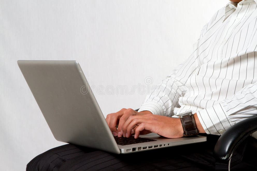 Typing on lap stock image. Image of caucasian, leather - 22420433