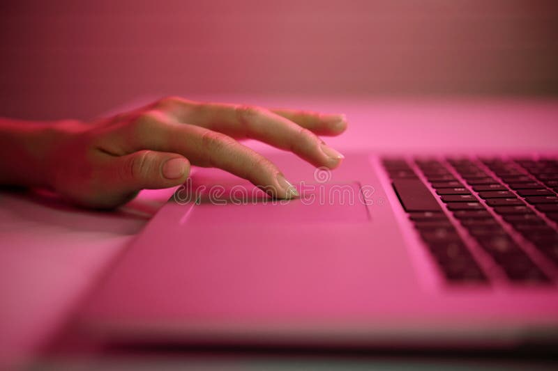 Typing on Laptop with Pink Ambient Lighting Stock Image - Image of ...