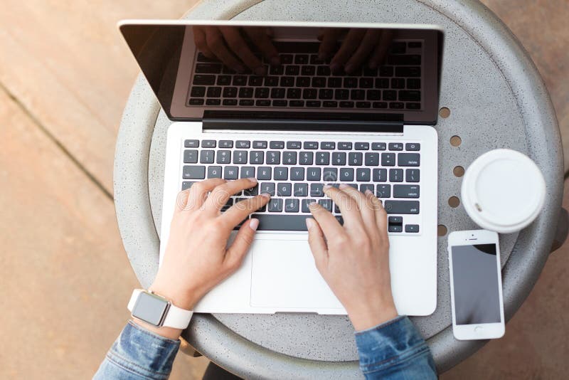 Typing on a laptop stock photo. Image of technology, shirt - 73990622