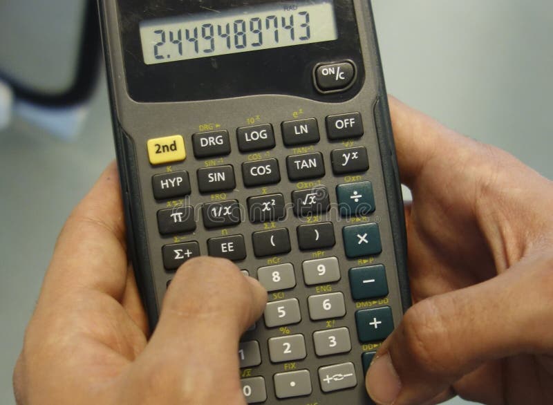 Typing Numbers in a Calculator Stock Photo - Image of devaluation ...