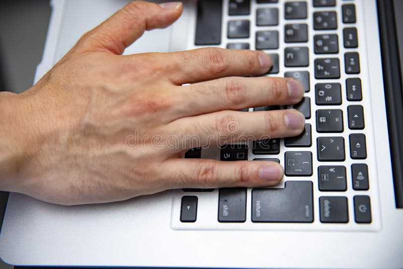 A Typing Right Hand on the Laptop Computer Stock Photo - Image of ...