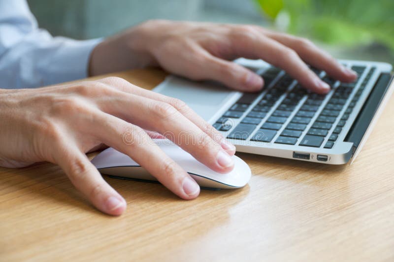 Typing and Using Mouse stock image. Image of working - 31022637