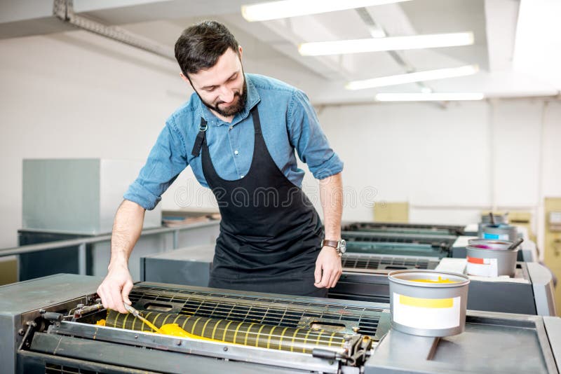 Typographer with Paint at the Manufacturing Stock Image - Image of ...