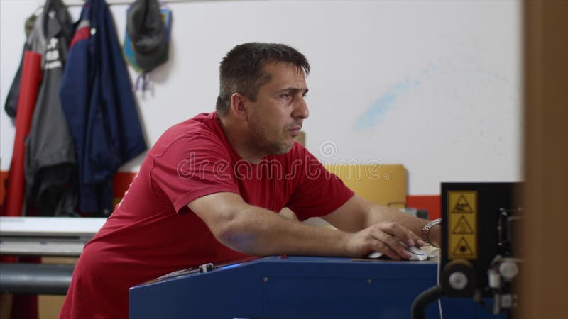 Man Worker in Print Office Working on Modern Computerized Printing ...