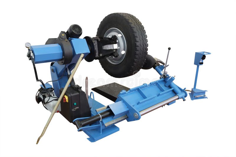 Tyre Fitting Machine and the Sets of Wheels Stock Image - Image of ...