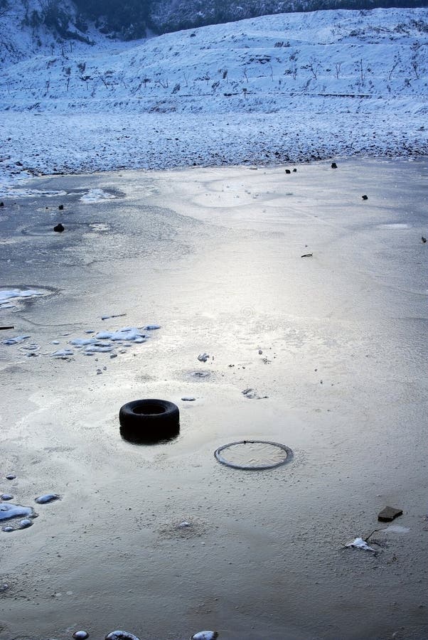 Tyre on the frozen lake stock photo. Image of ring, lake - 14291592
