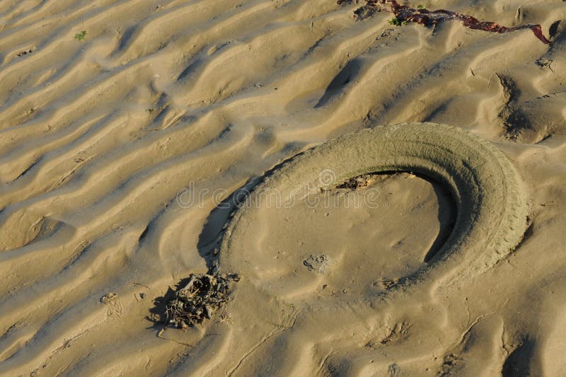 Tyre in sand stock photo. Image of nature, coastal, coast - 21680206