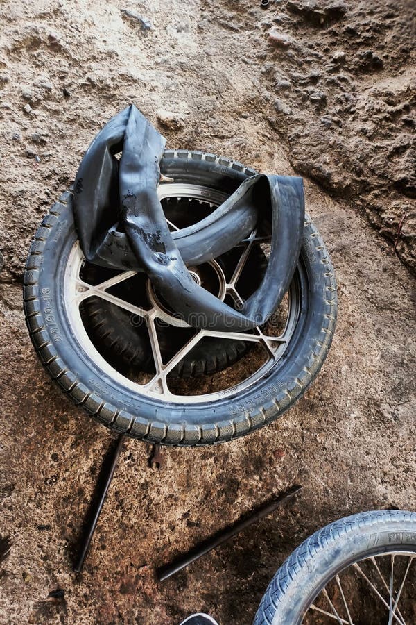 Tyre and tube stock photo. Image of iron, tyre, workstation - 249127866