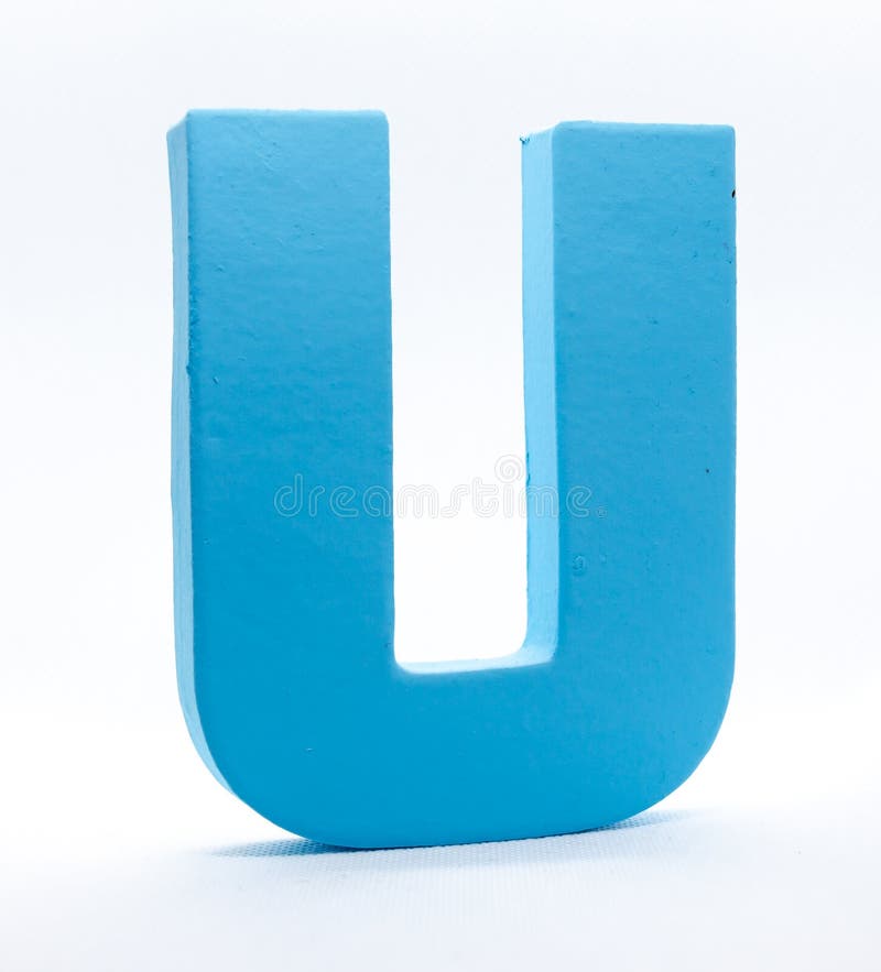 A blue U stock photo. Image of wood, background, symbol - 194400914