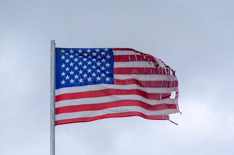 U.S. Flag Damaged by the Weather Stock Photo - Image of flagpole, hall ...