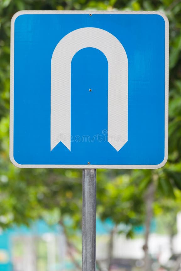 U-turn allowed road sign stock photo. Image of person - 20780688